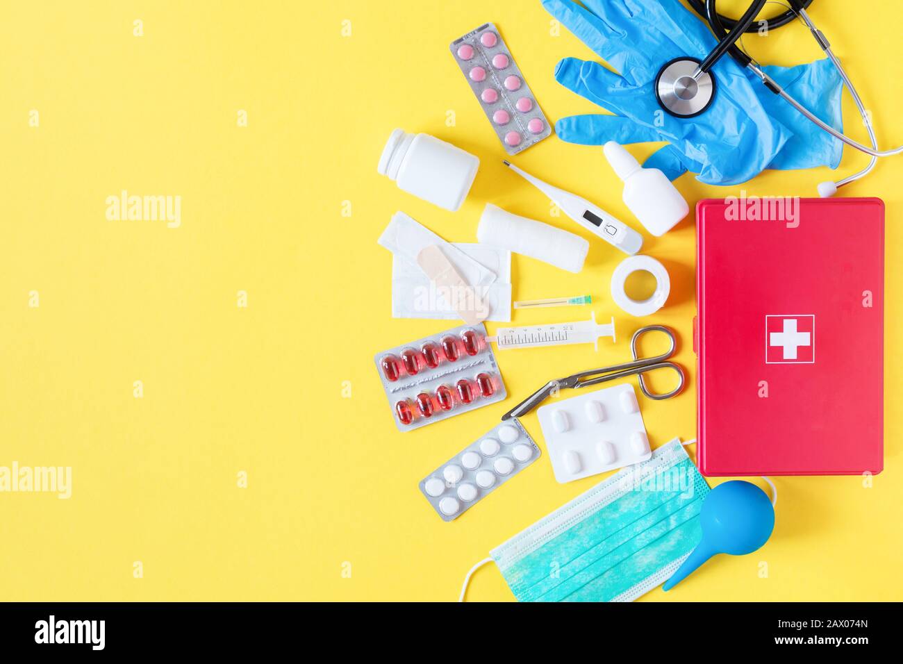 First aid kit red box with medical equipment and medications for ...