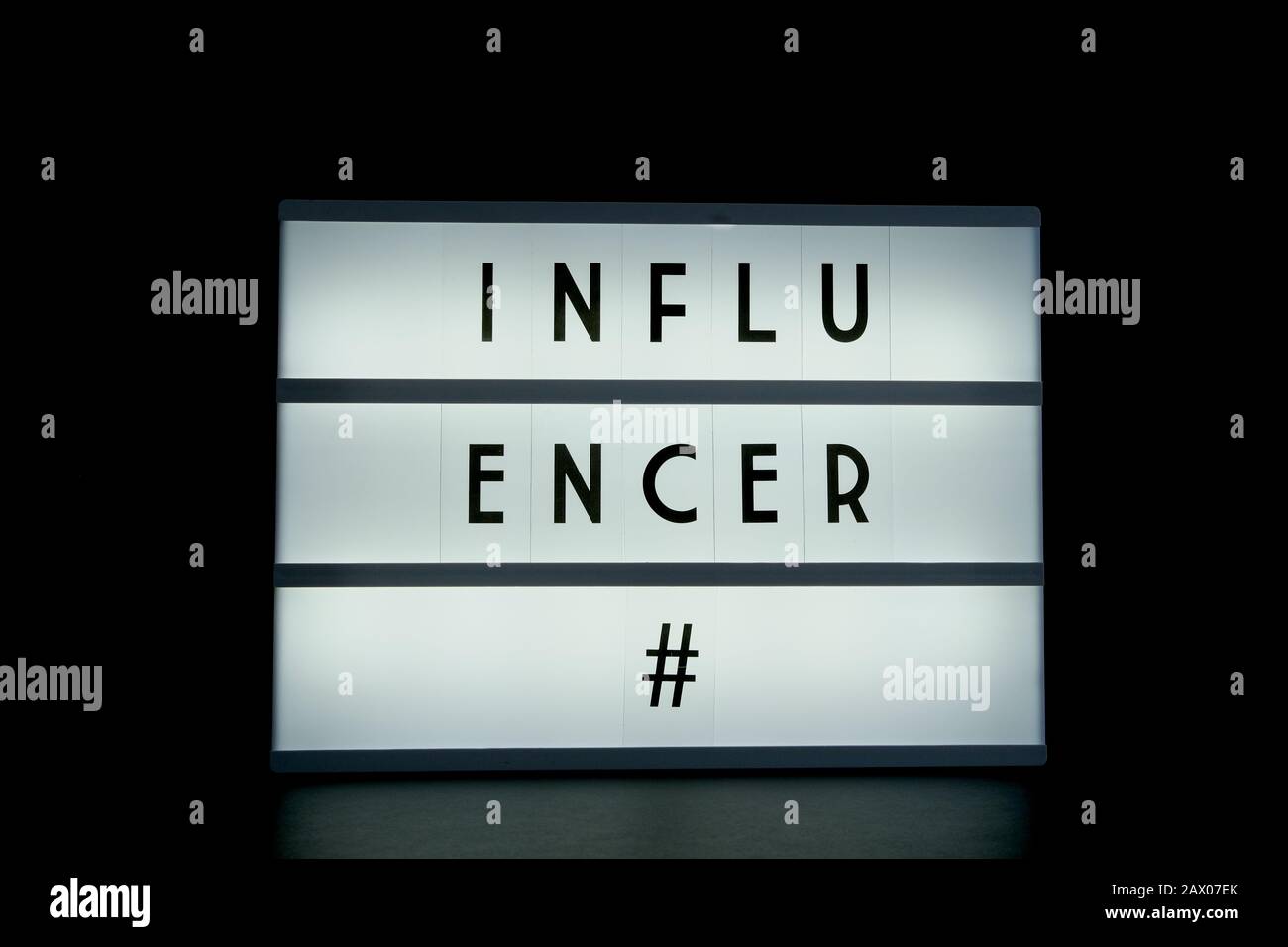 Display device with the word influencer and a hashtag sign Stock Photo ...