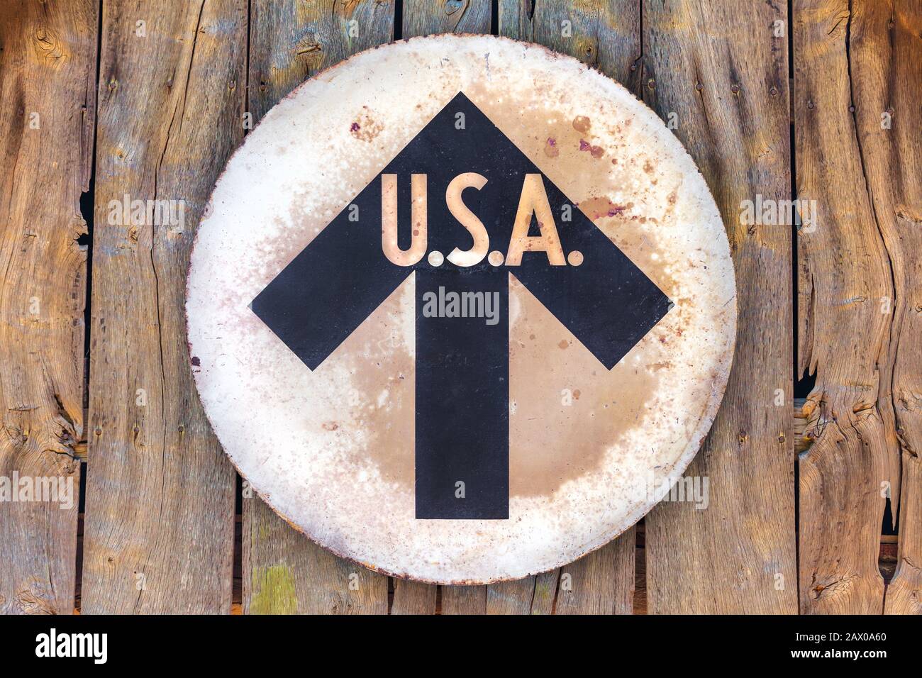 Vintage USA direction sign hanging on an old wooden wall Stock Photo ...