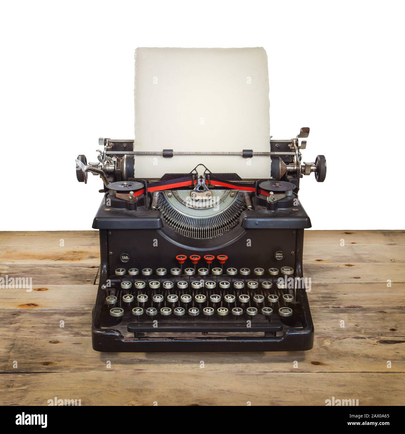 Old Dutch typewriter on a vintage wooden floor isolated on white Stock ...