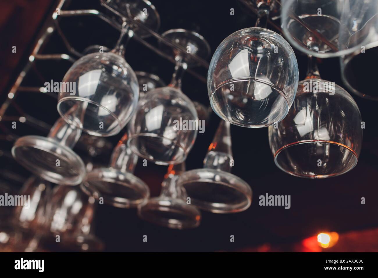 Closeup many upside down empty clear transparent crystal upturned wine ...