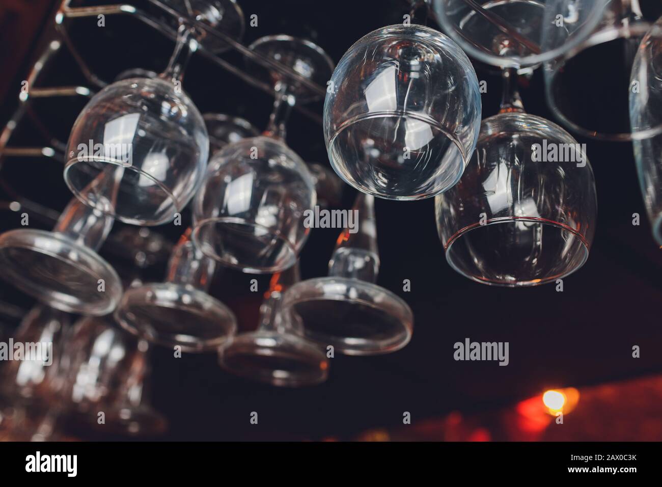 Closeup many upside down empty clear transparent crystal upturned wine ...