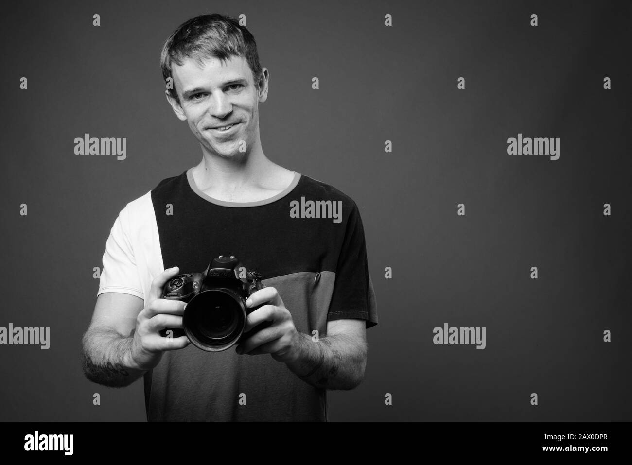 Man, not looking at camera Black and White Stock Photos & Images - Alamy