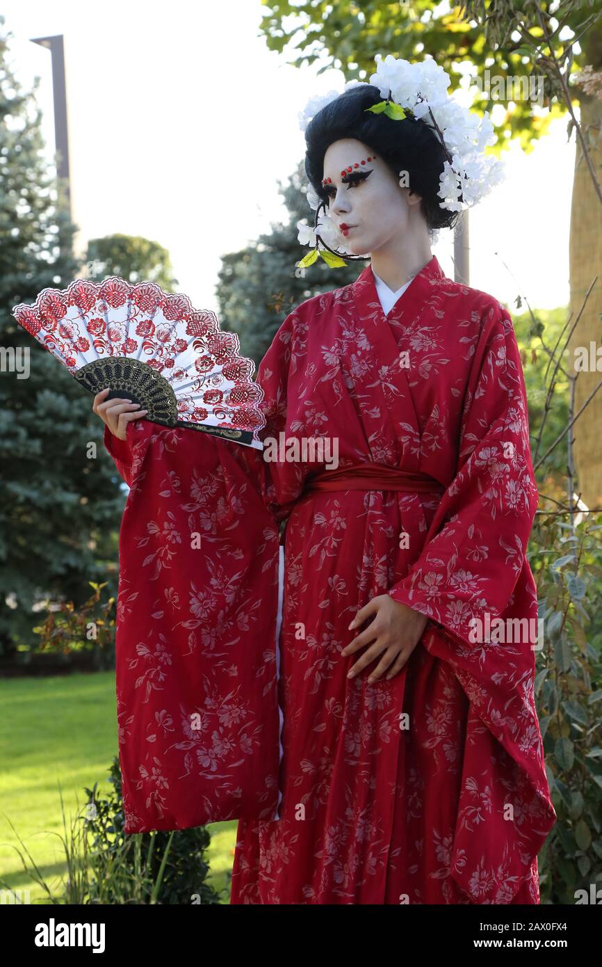 Timisoara, Romania- 09.06.2019 Living statue of a Japanese geisha ...
