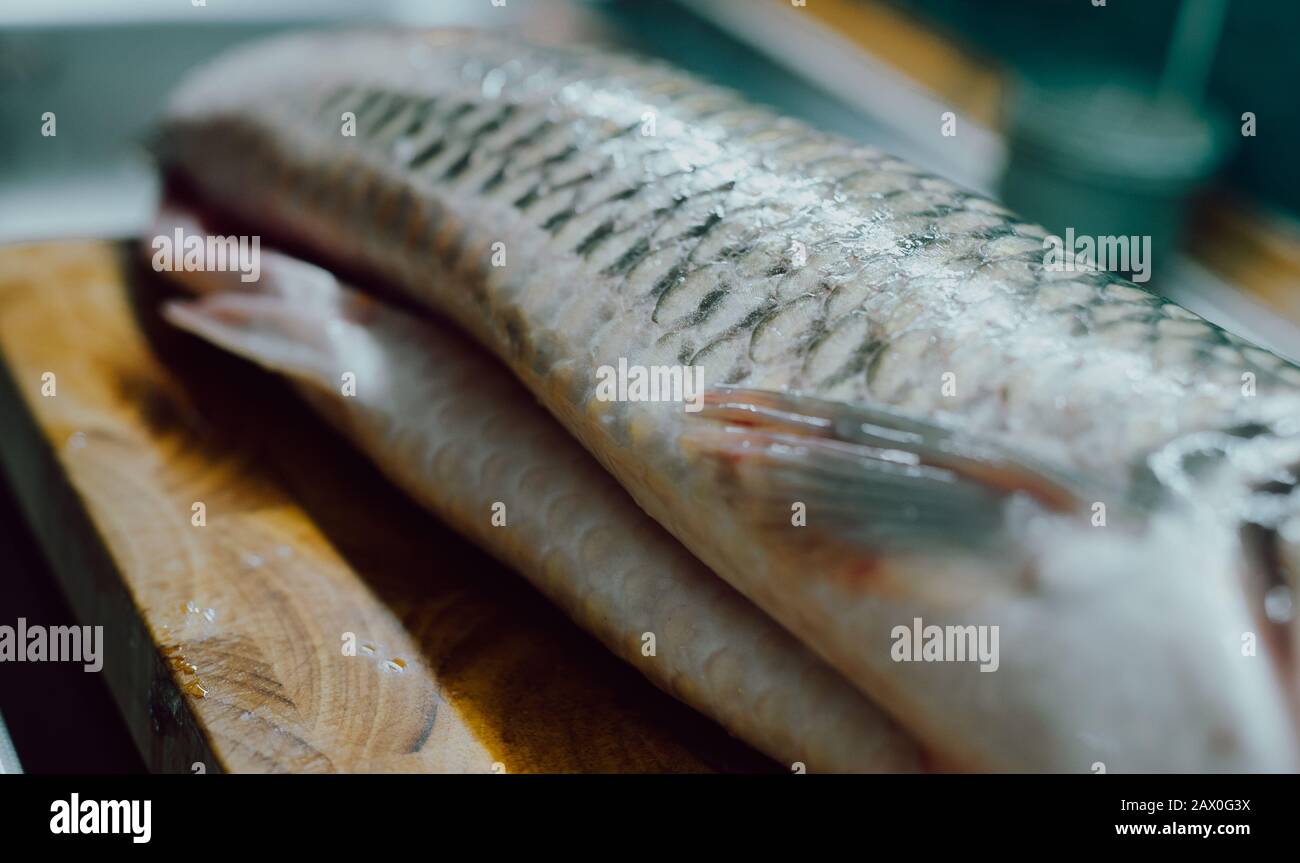 Fish on the board hi-res stock photography and images - Alamy