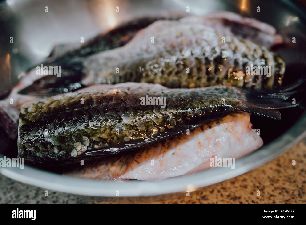 Fresh Fish in Bowl in Kitchen Stock Photo - Alamy
