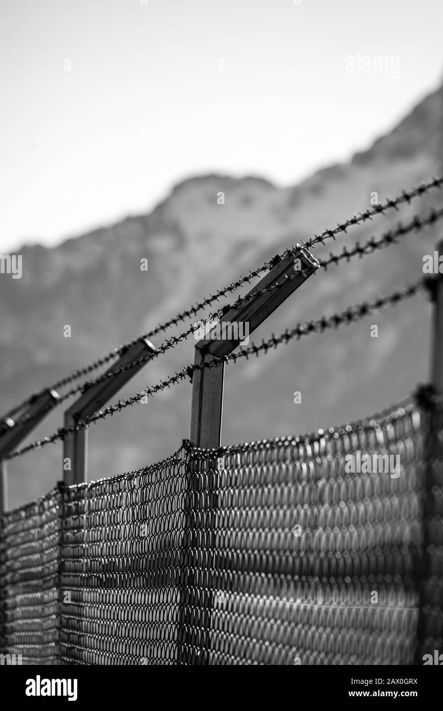 Military fence, demarcate the border, closeup, blurry background Stock ...