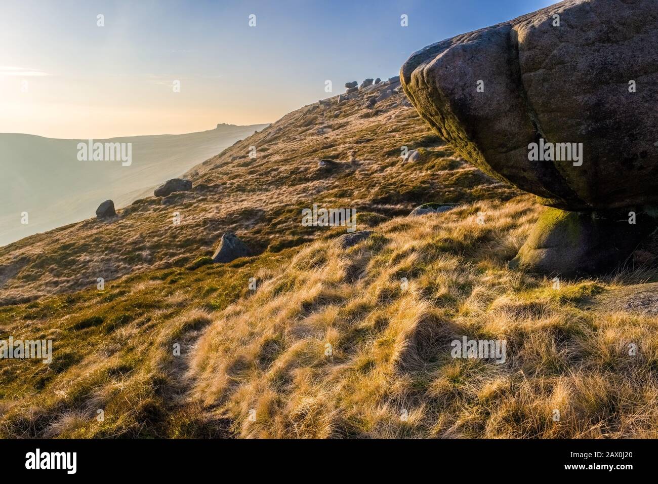 Sunset on a winter afternoon on the western edges of Kinder Scout in ...