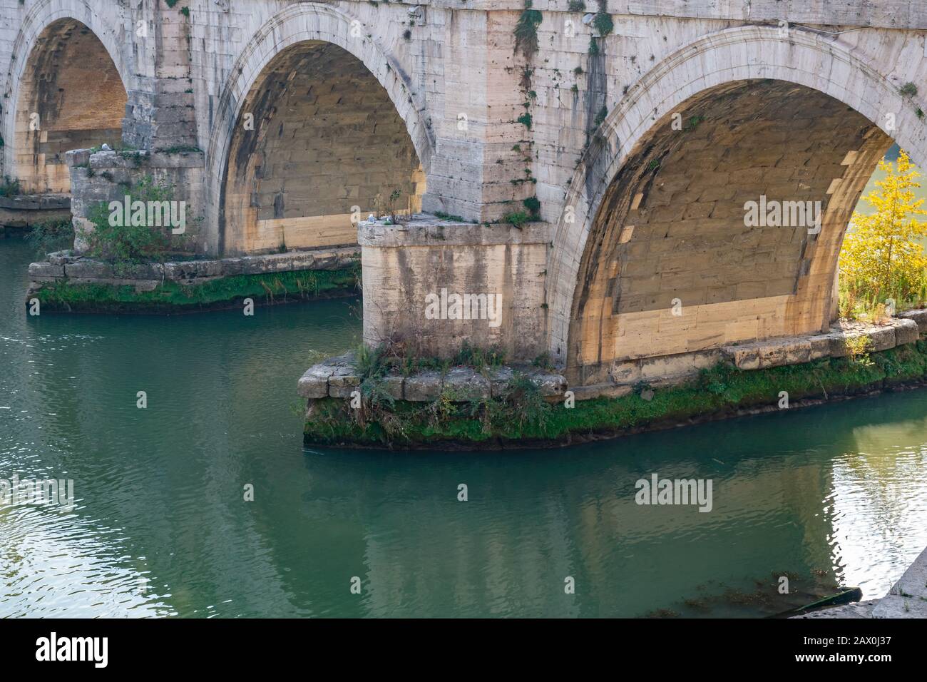 Old historical bridge on Tiber river Rome Stock Photo - Alamy