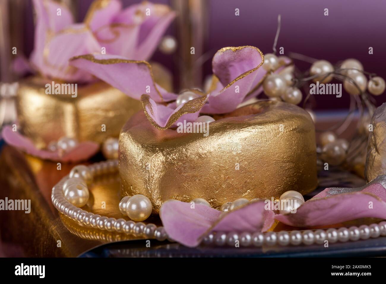Wedding gold sweets, arrangement Stock Photo - Alamy