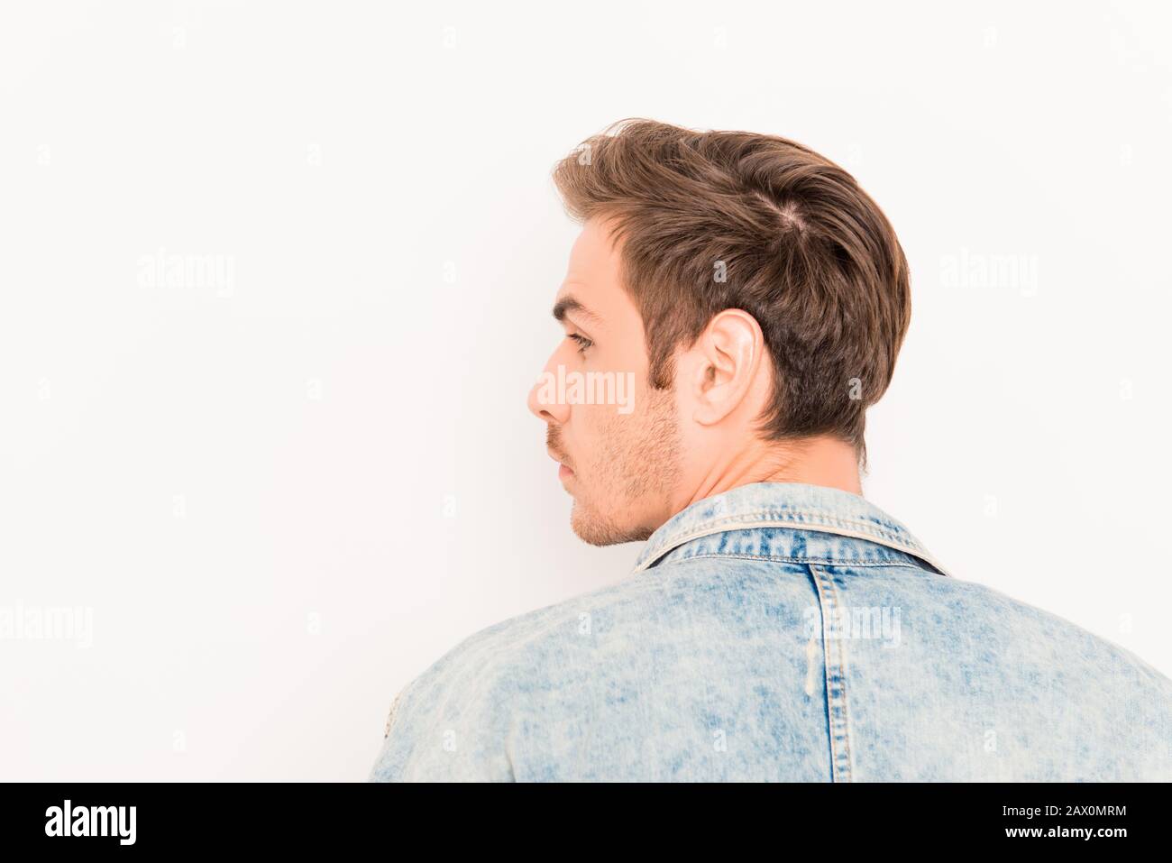 Back view of young handsome man on white background Stock Photo - Alamy