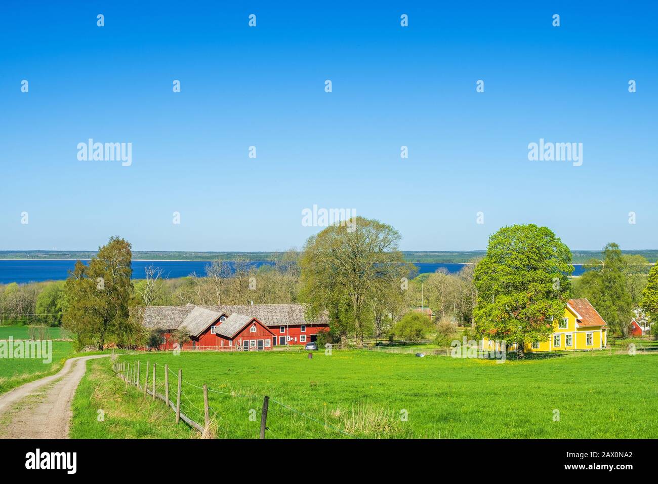 Farm in the countryside in a beautiful spring landscape Stock Photo - Alamy
