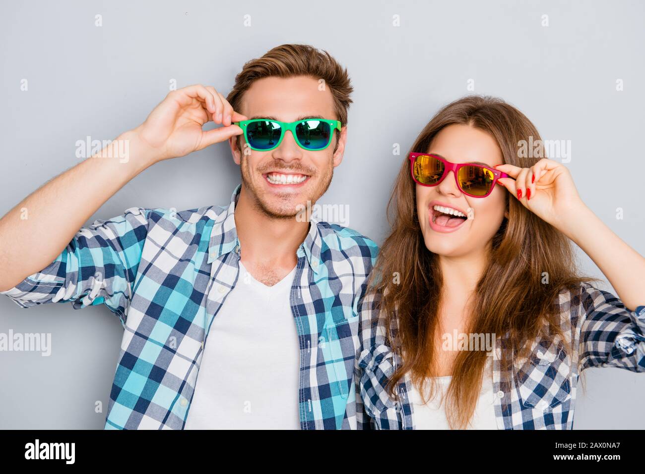 Portrait of happy smiling couple in love wearing spectacles Stock Photo ...