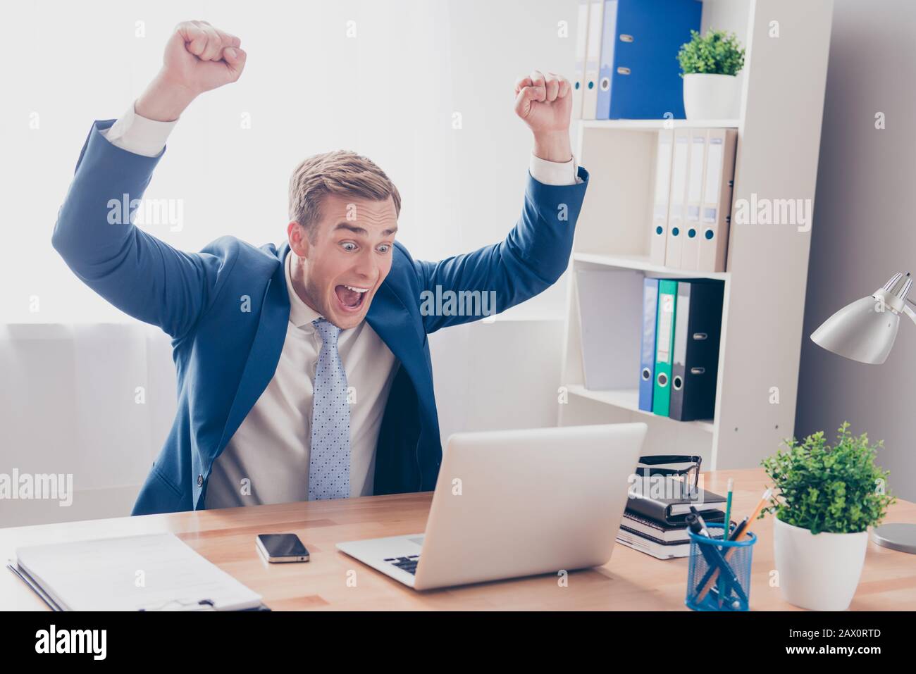 Yes! Happy businessman successfuly completed his task Stock Photo - Alamy
