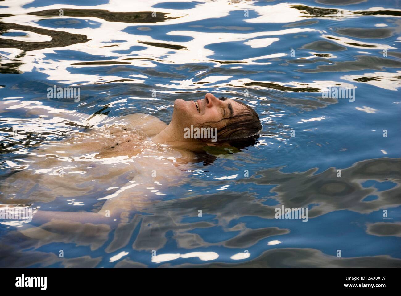 Person swimming in cenote hi-res stock photography and images - Alamy