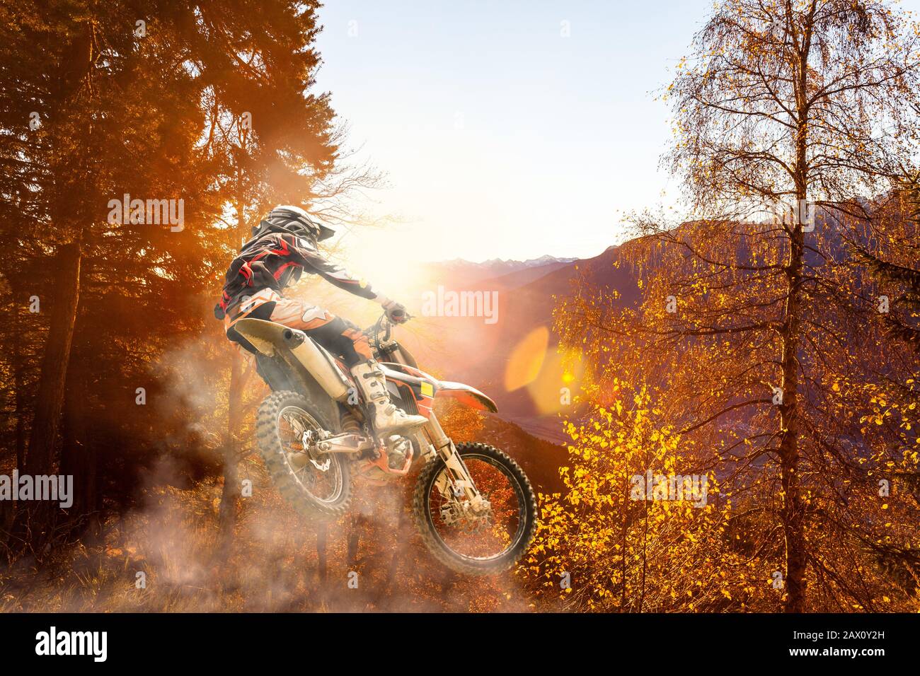 man with motocross at sunset Stock Photo - Alamy