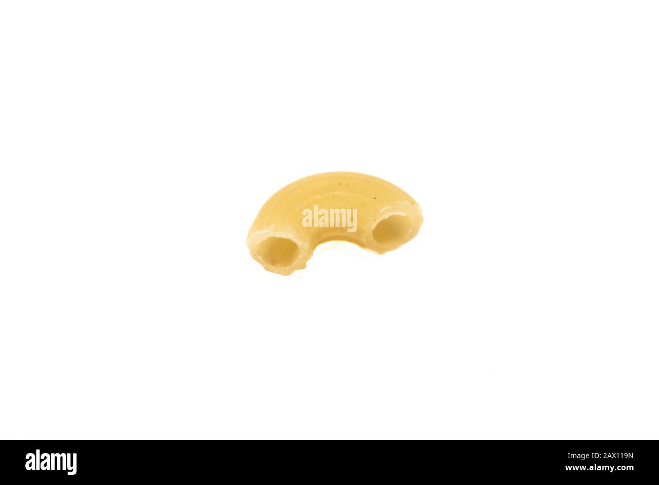 One makaroni pasta isolated on white background Stock Photo - Alamy