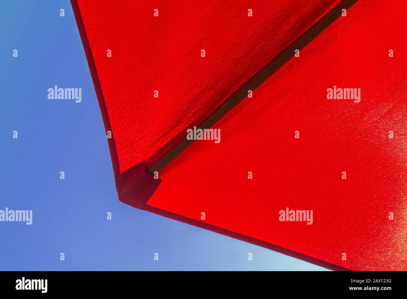 Abstract views of a red sun canopy Stock Photo - Alamy