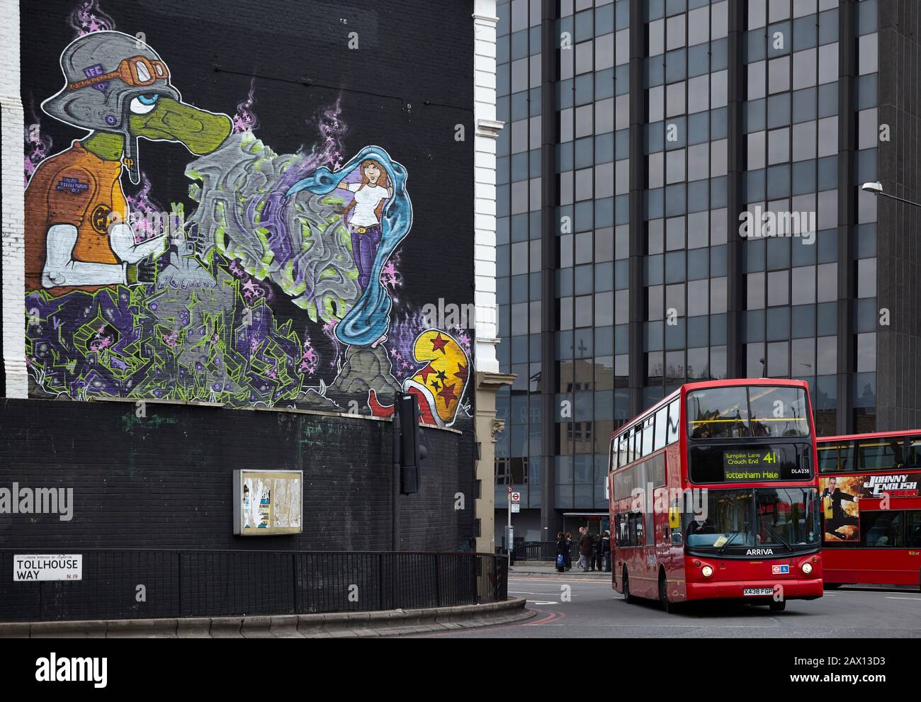 London bus 41 driving past graffiti by Vaugn Bode at Tollhouse Way ...