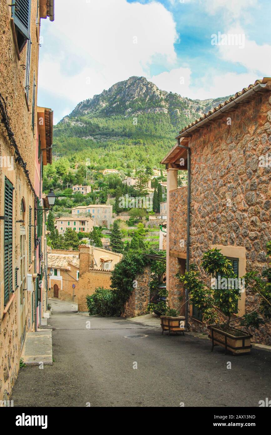 typical spanish styled streets in Deia town at the west coast of ...