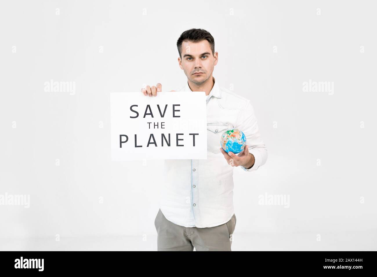 Save planet earth and environment concept. Young Caucasian man ...