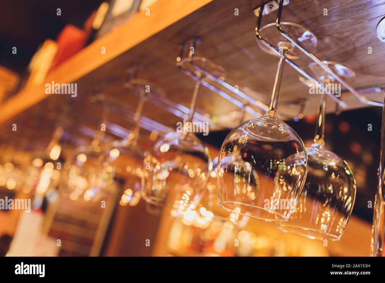Closeup many upside down empty clear transparent crystal upturned wine ...