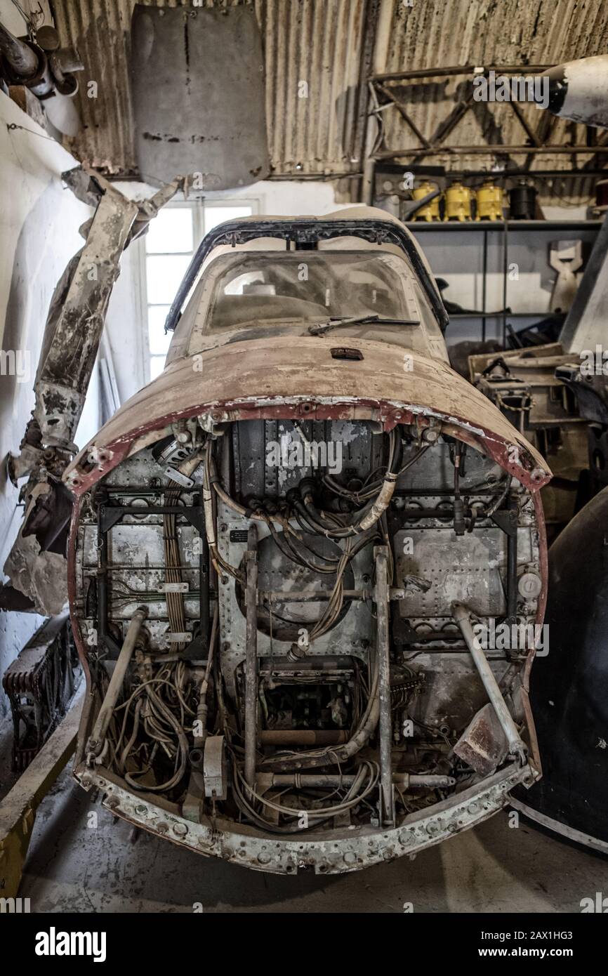 Cockpit section from an old aircraft lying in a workshop Stock Photo ...