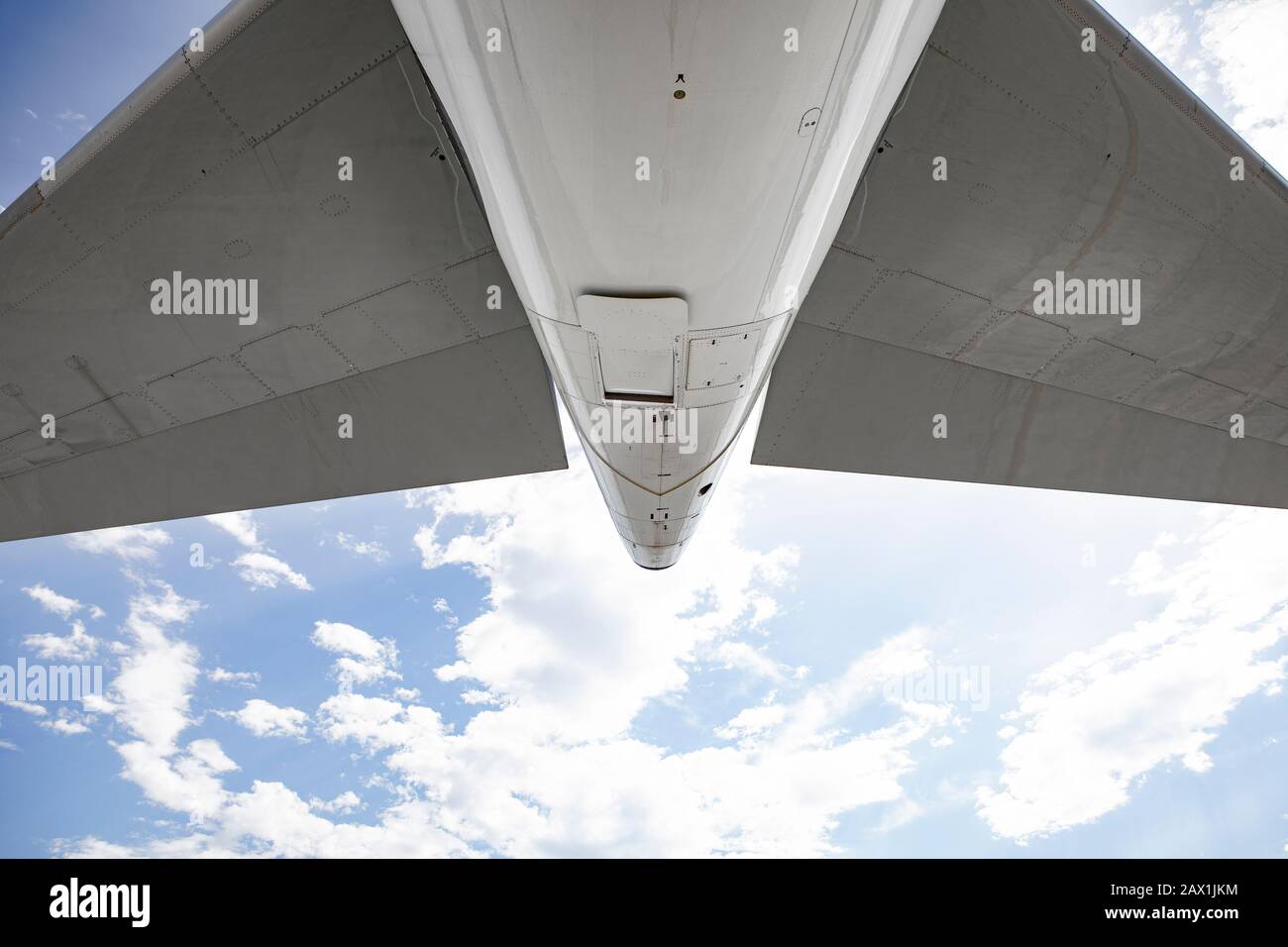 Rear view of jet airliner against blue sky Stock Photo - Alamy