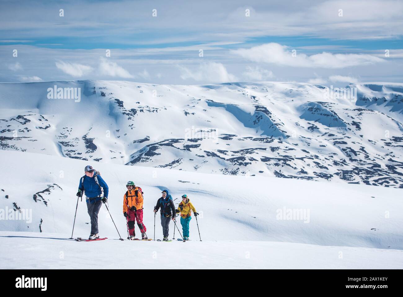 A group of skiers touring in snowy mountains in Iceland Stock Photo - Alamy