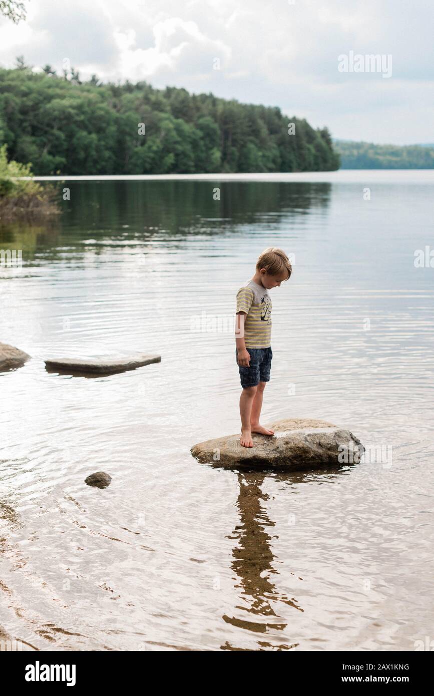Boy standing on a hi-res stock photography and images - Alamy