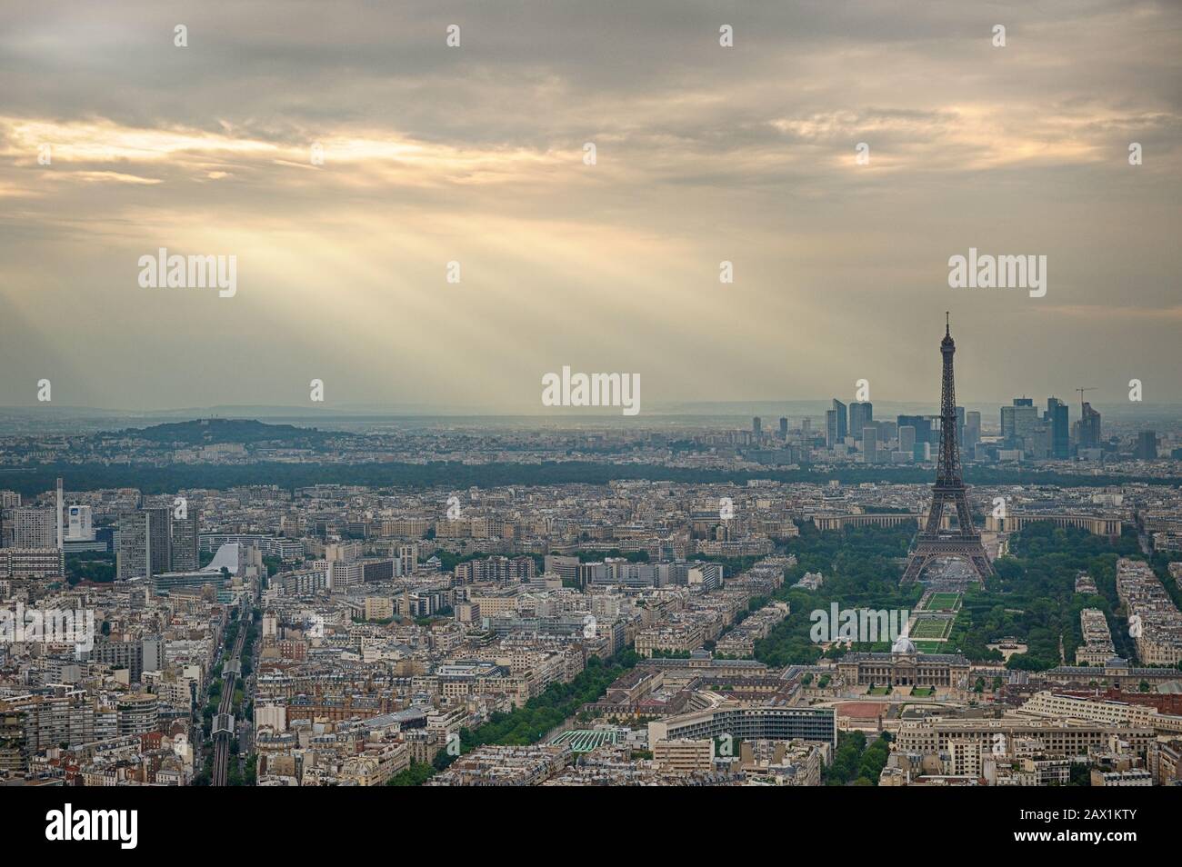 Aerial view of Paris, France. Eiffel tower in overcast sky with light ...