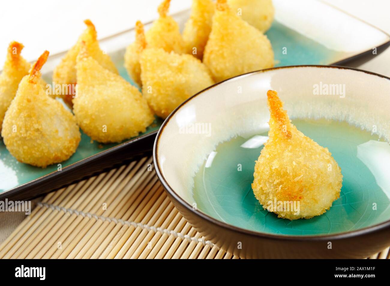 Pear shape fried Chinese dumplings, stuffed with diced pork, bamboo and ...