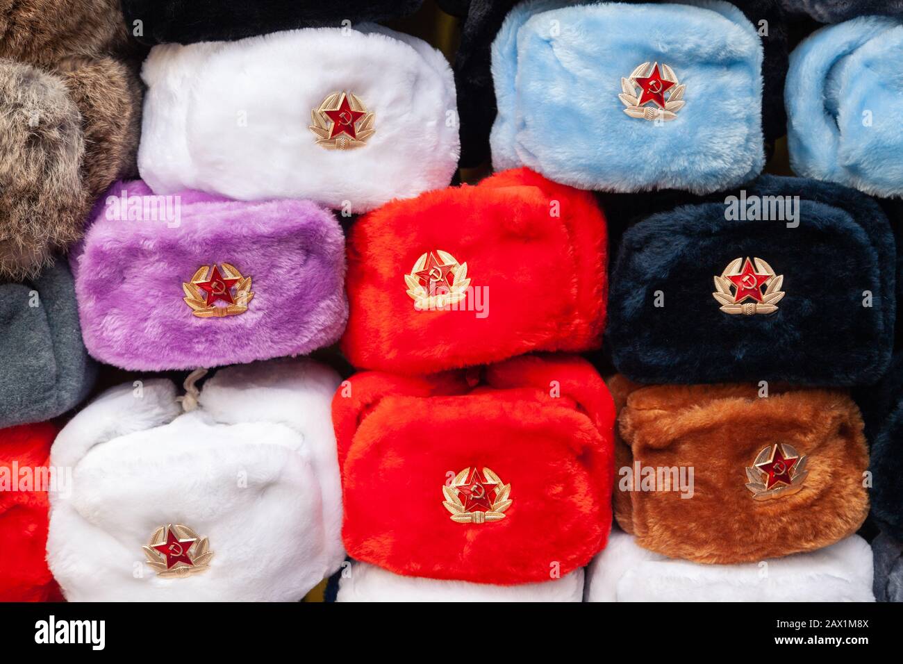 Earflaps fur caps with red stars in souvenir shop in Moscow street ...