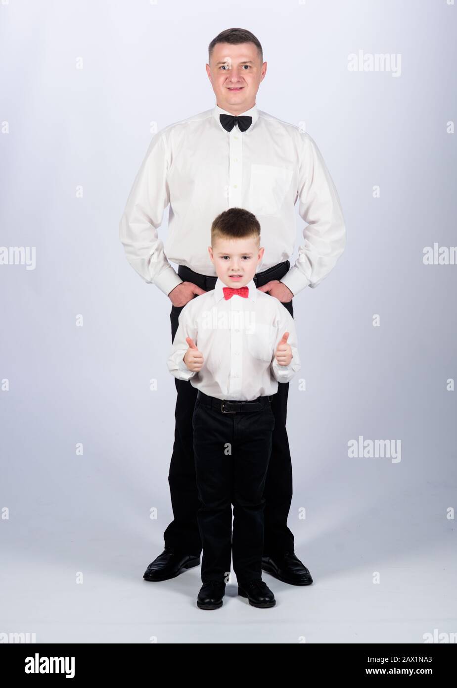 art director. father and son in formal suit. little boy with dad ...