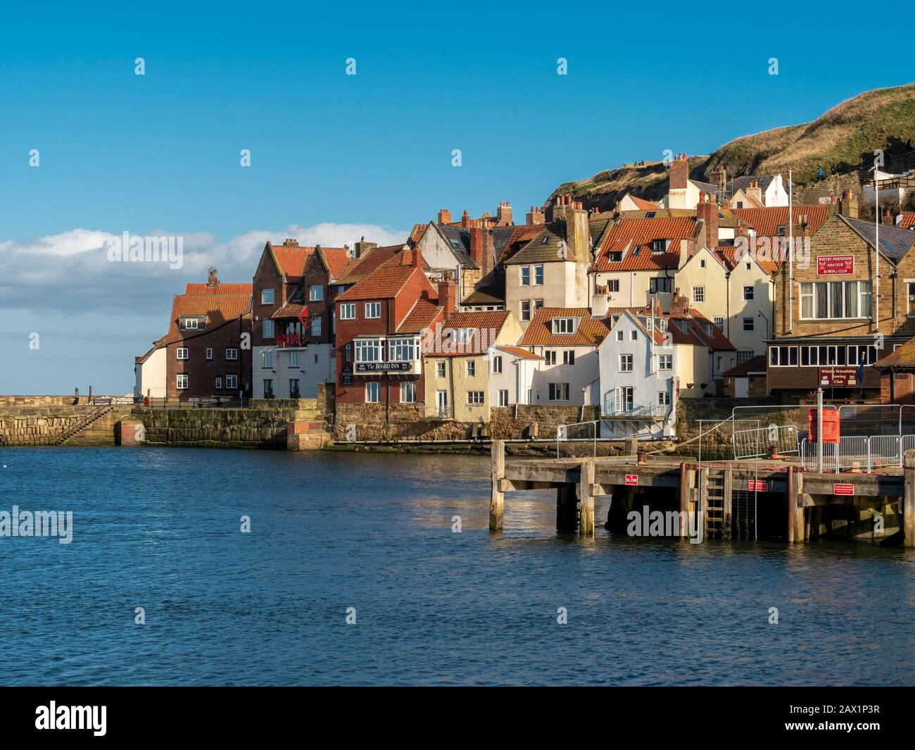 Houses at the base of the East Cliff, Whitby, UK Stock Photo - Alamy