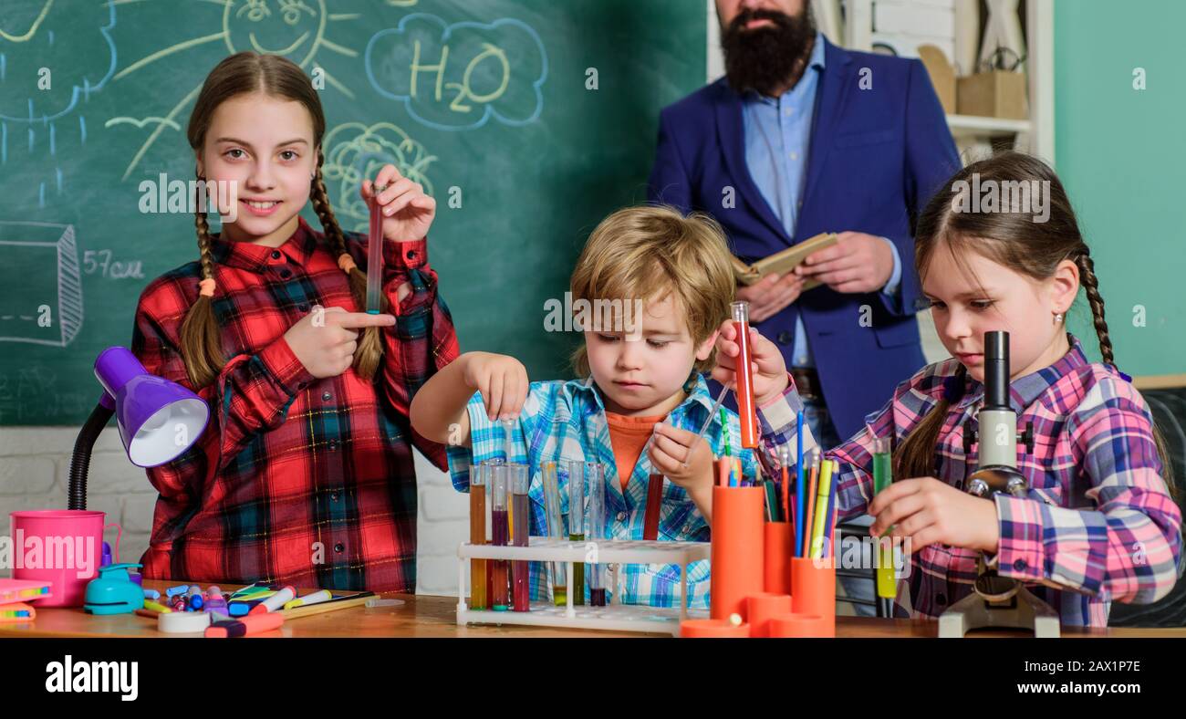 Preparing to exams. children making science experiments. Education ...