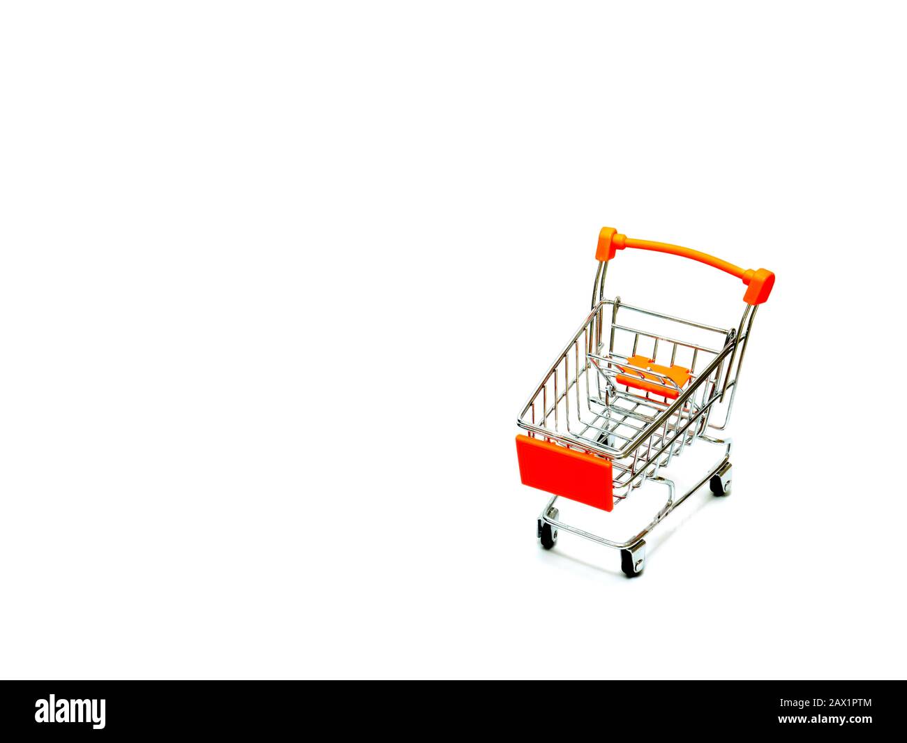 Mini shopping cart isolated on white background Stock Photo - Alamy