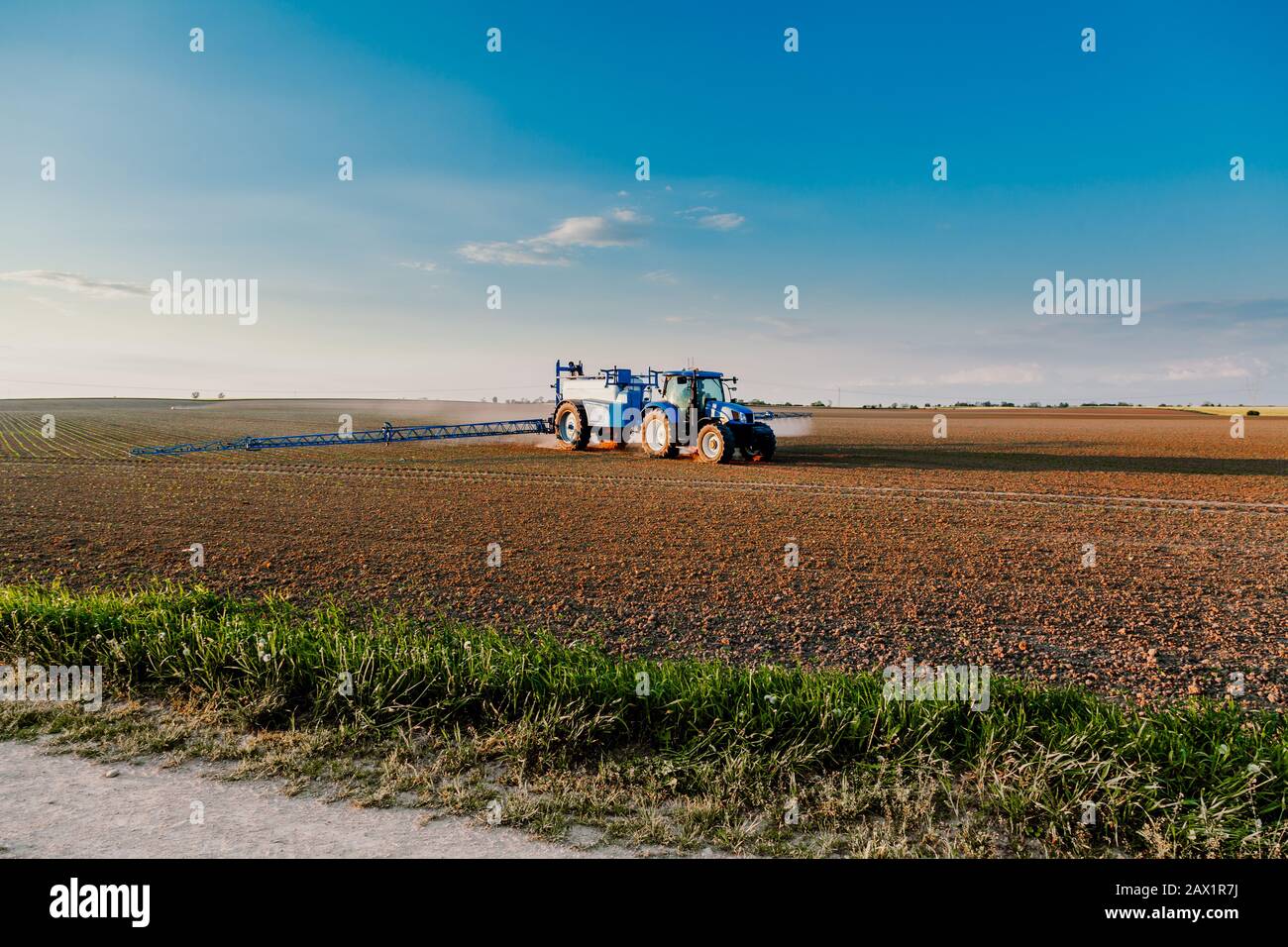 tractor working in field agriculture Stock Photo - Alamy
