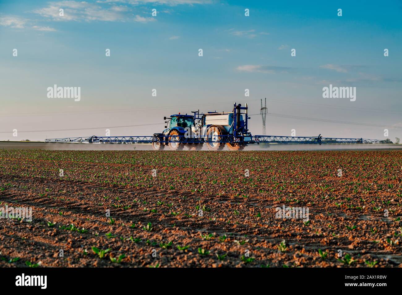 tractor working in field agriculture Stock Photo - Alamy