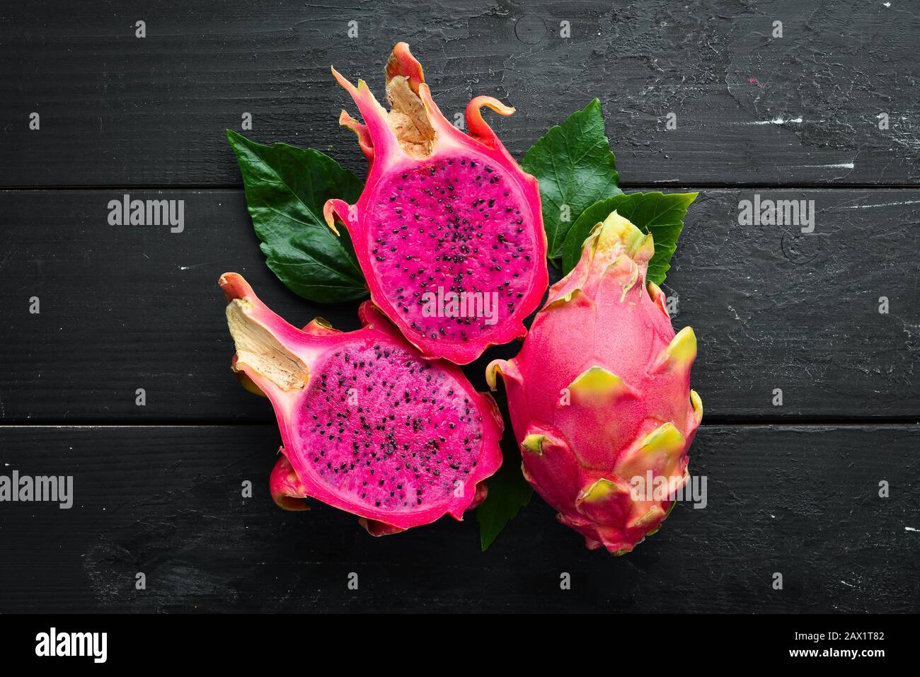 Red Pitahaya on a black background. Fruit Dragon. Tropical Fruits. Top ...