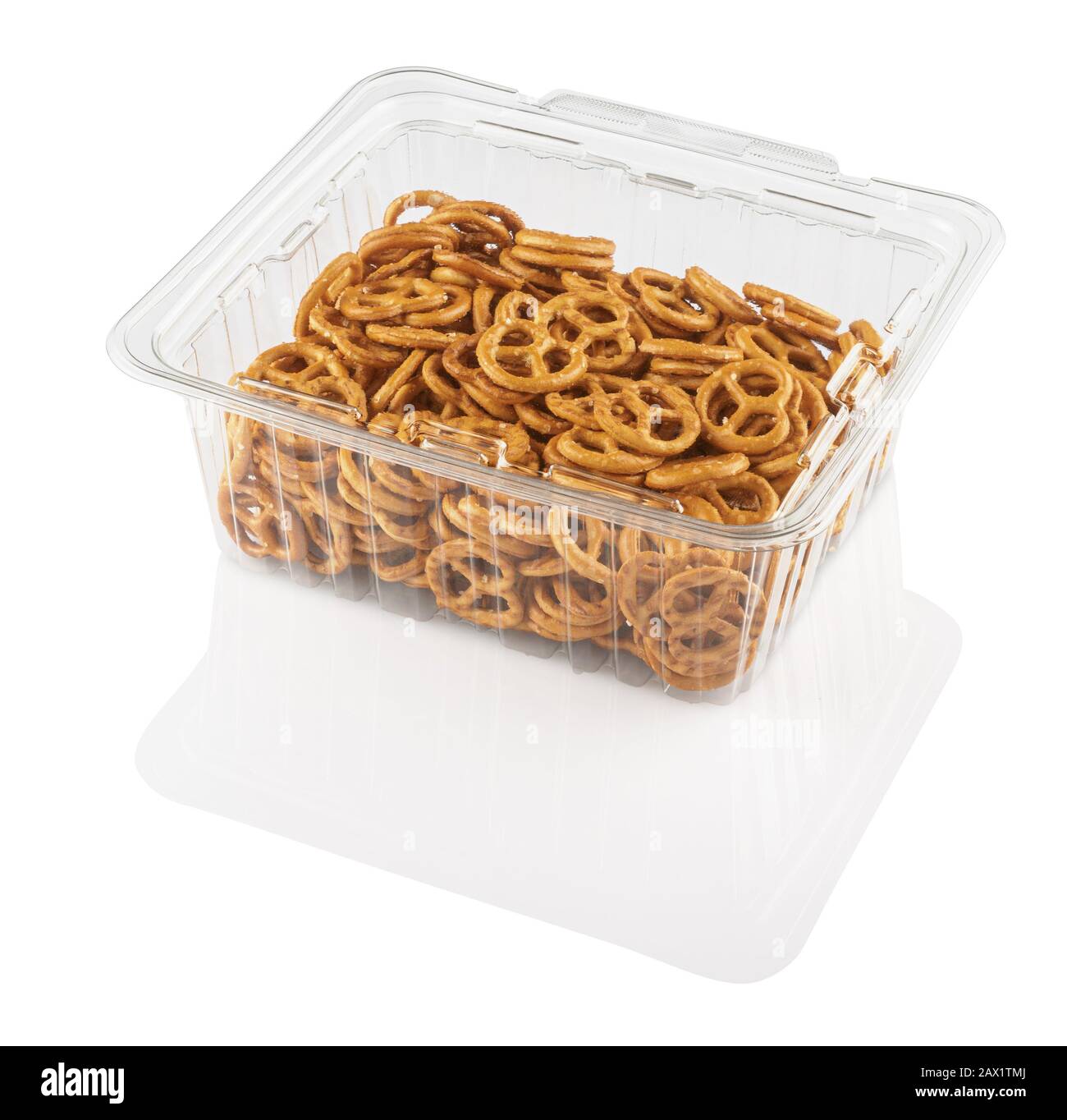 crackers in a transparent plastic container on a white background ...