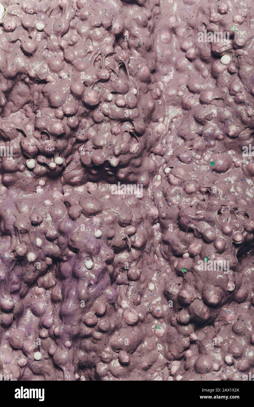 Kid Playing Hand Made Toy Called Slime Alien drool Shell mussel Stock ...