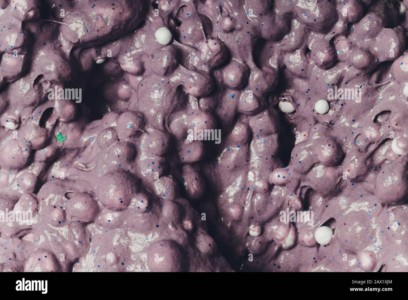 Kid Playing Hand Made Toy Called Slime Alien drool Shell mussel Stock ...