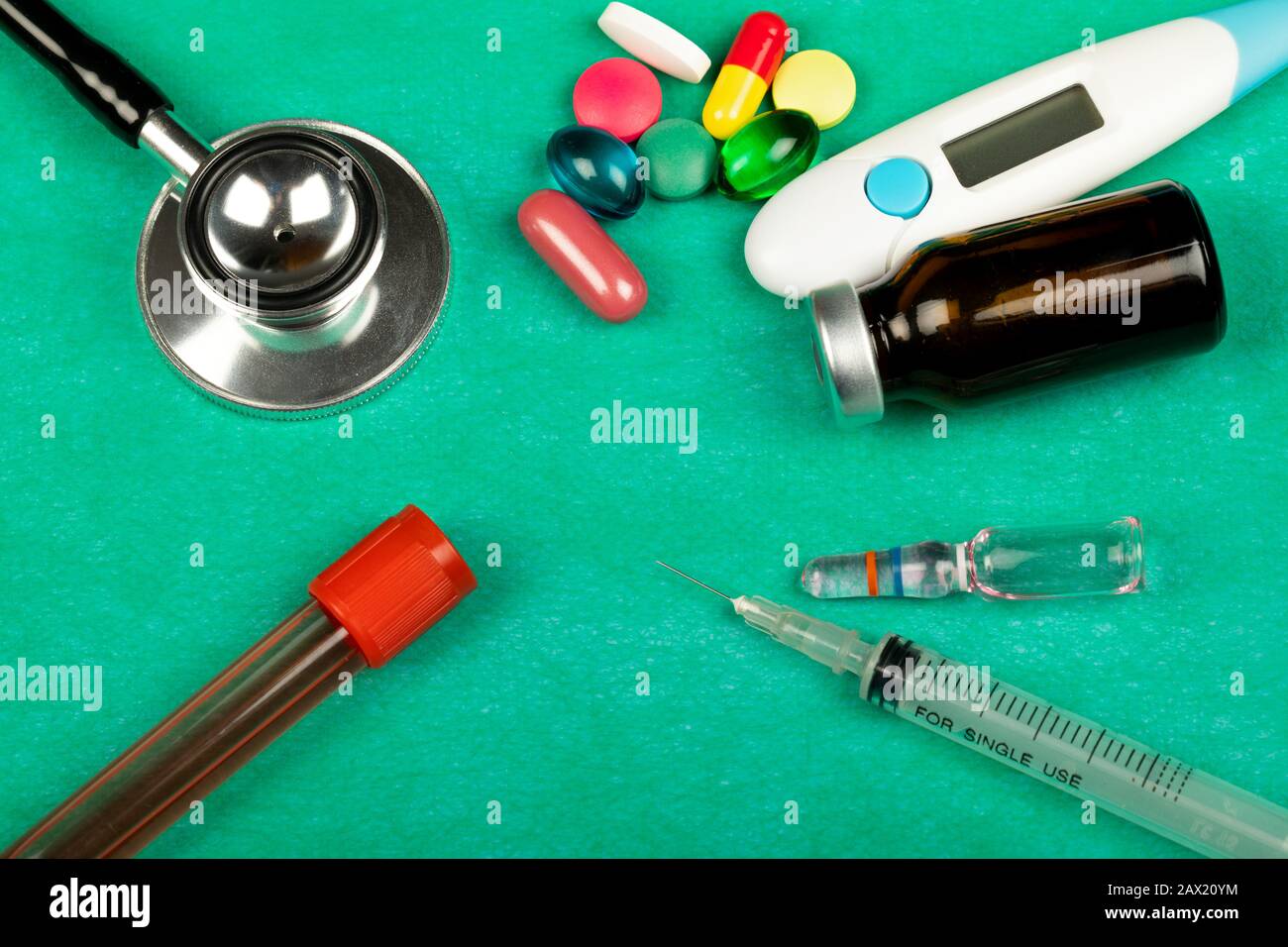 Picture of a colourful pills, capsules, stethoscope and pack of ...