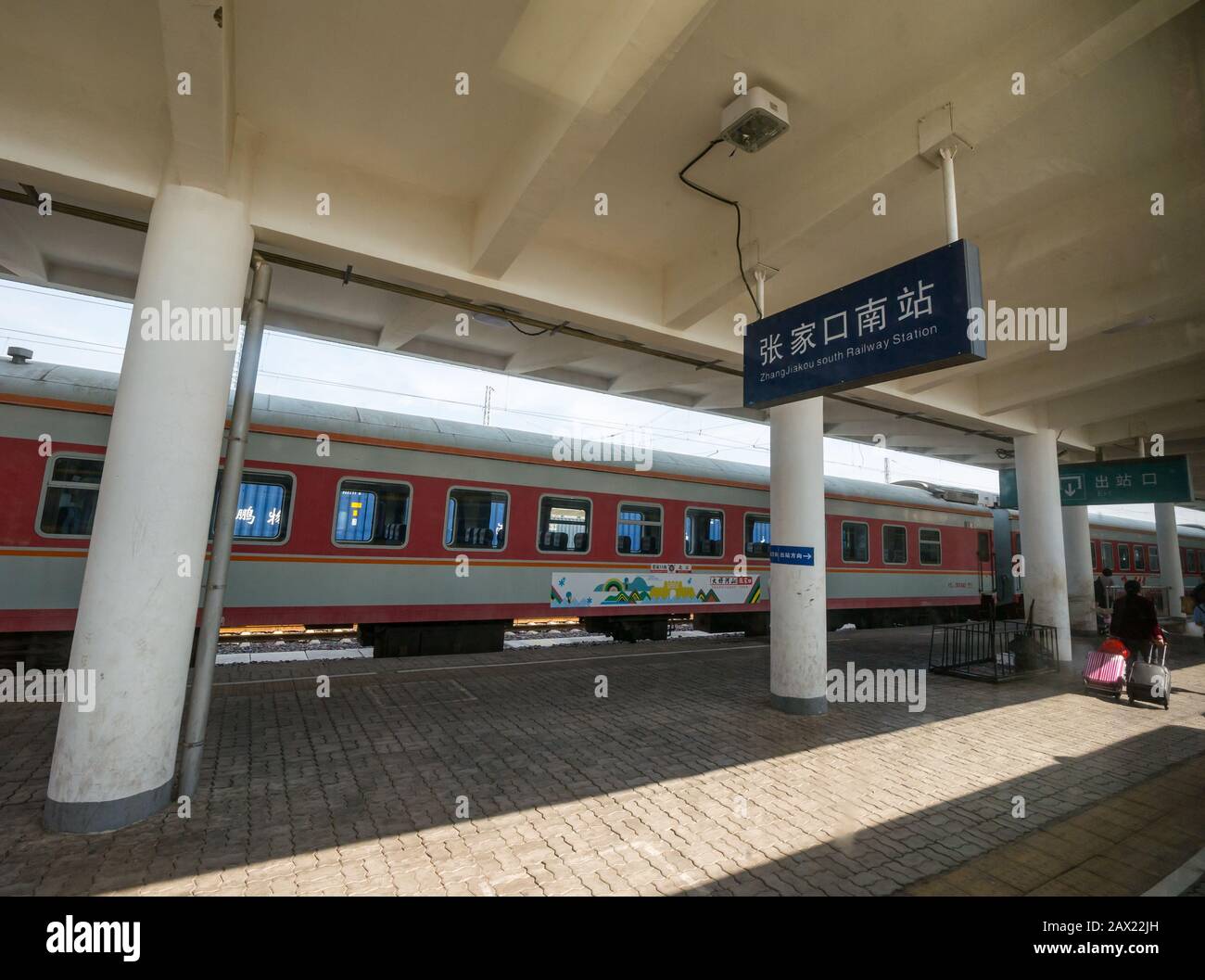 Chinese passengers with luggage on Intercity Zhangjiakou South railway ...