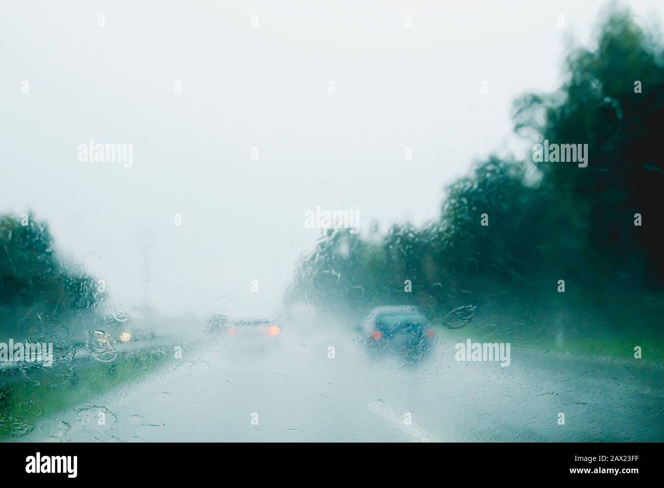 Driving on a highway with rain Stock Photo - Alamy