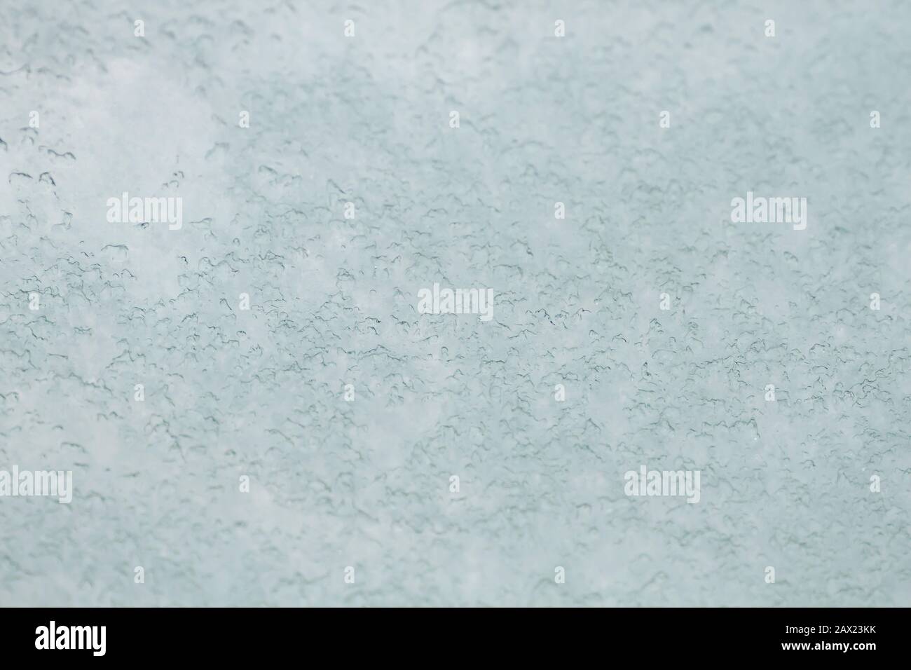Frosted snow on a window glass Stock Photo - Alamy
