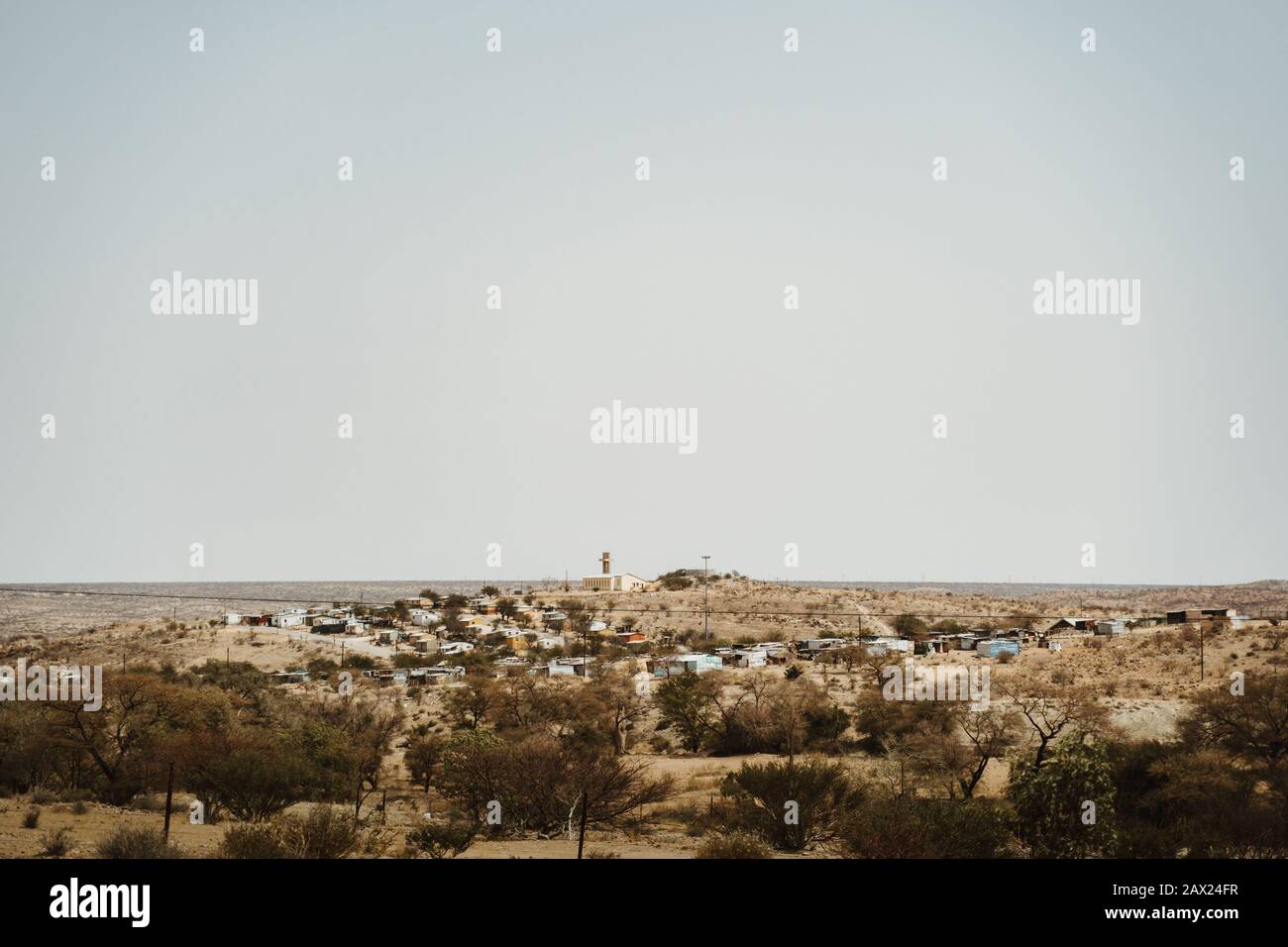 distant wideangle view of African village town Stock Photo - Alamy