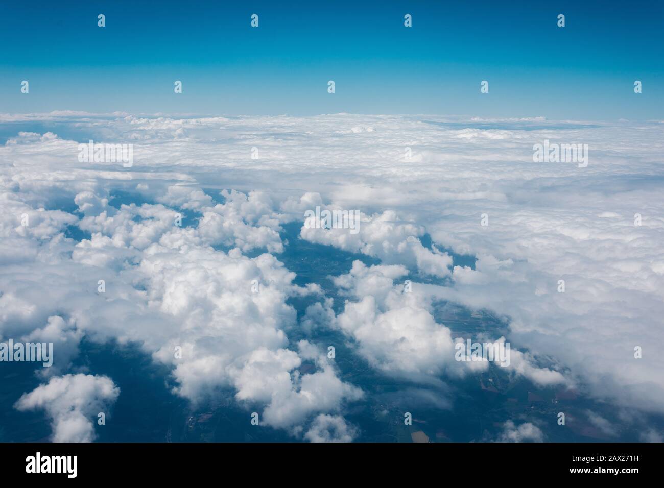 Sky with clouds from airplane window during flight Stock Photo - Alamy