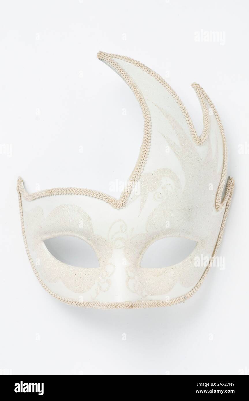 White teather venetian carnival mask on white background, vertical shot ...